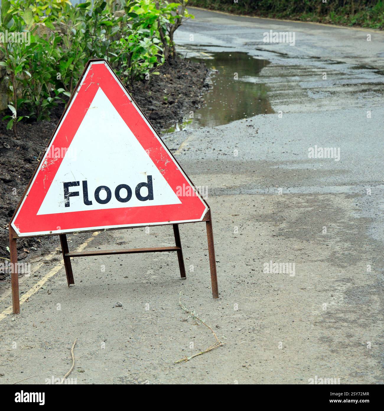 Temporary triangle flood warning sign, Saltford, near Bristol, England ...