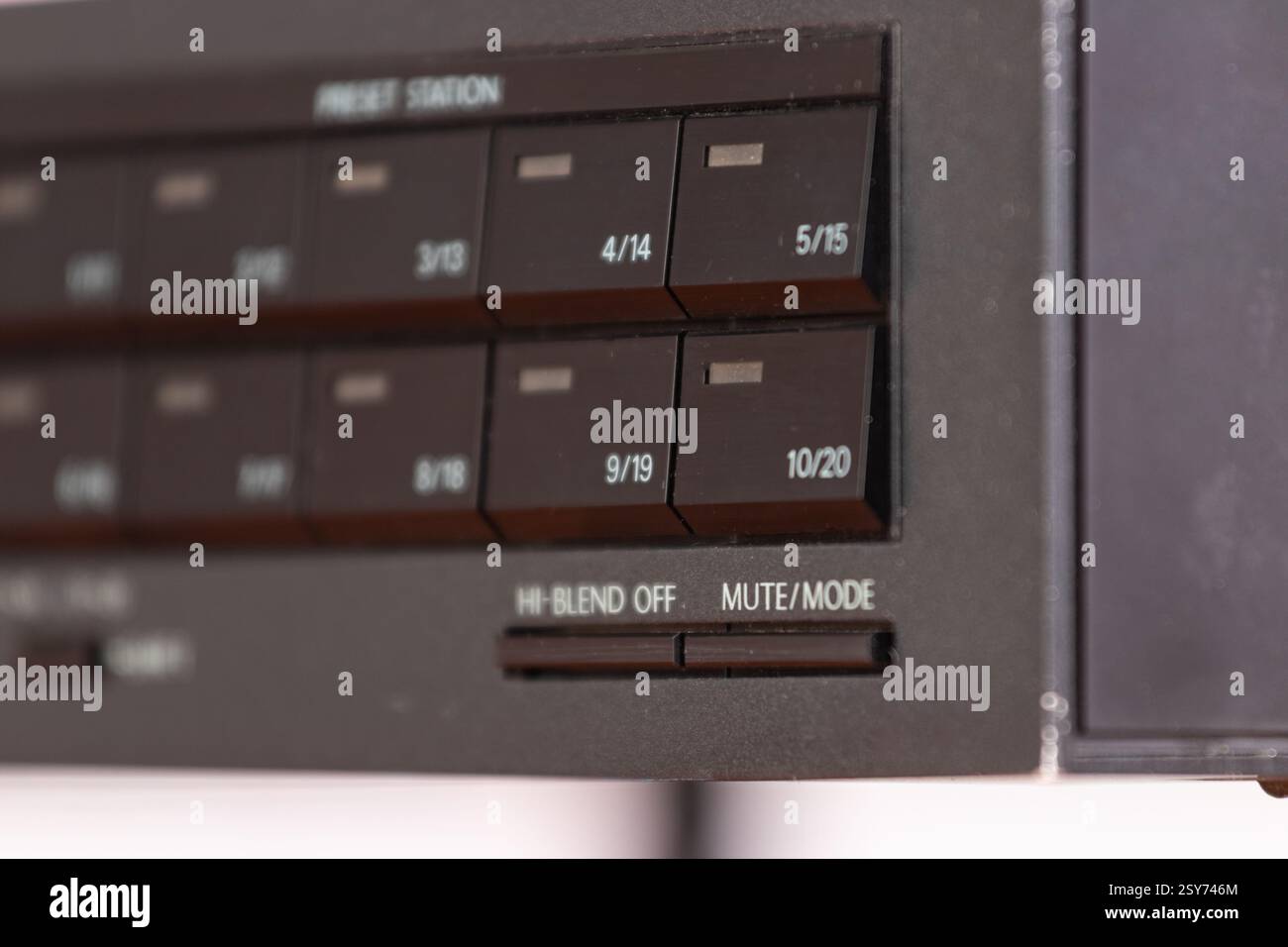 Detailed examination of a vintage radio with a focus on its preset ...