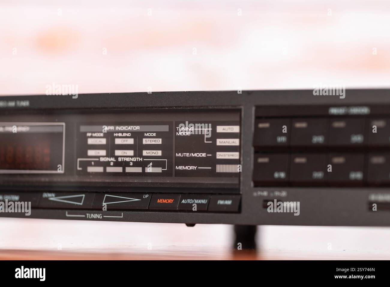 Detailed examination of a vintage radio with a focus on its preset ...