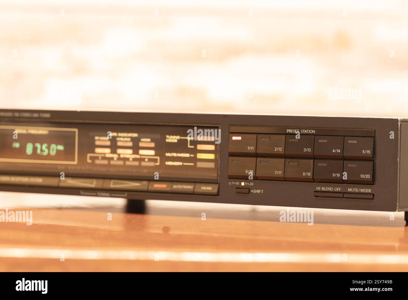 Detailed examination of a vintage radio with a focus on its preset ...