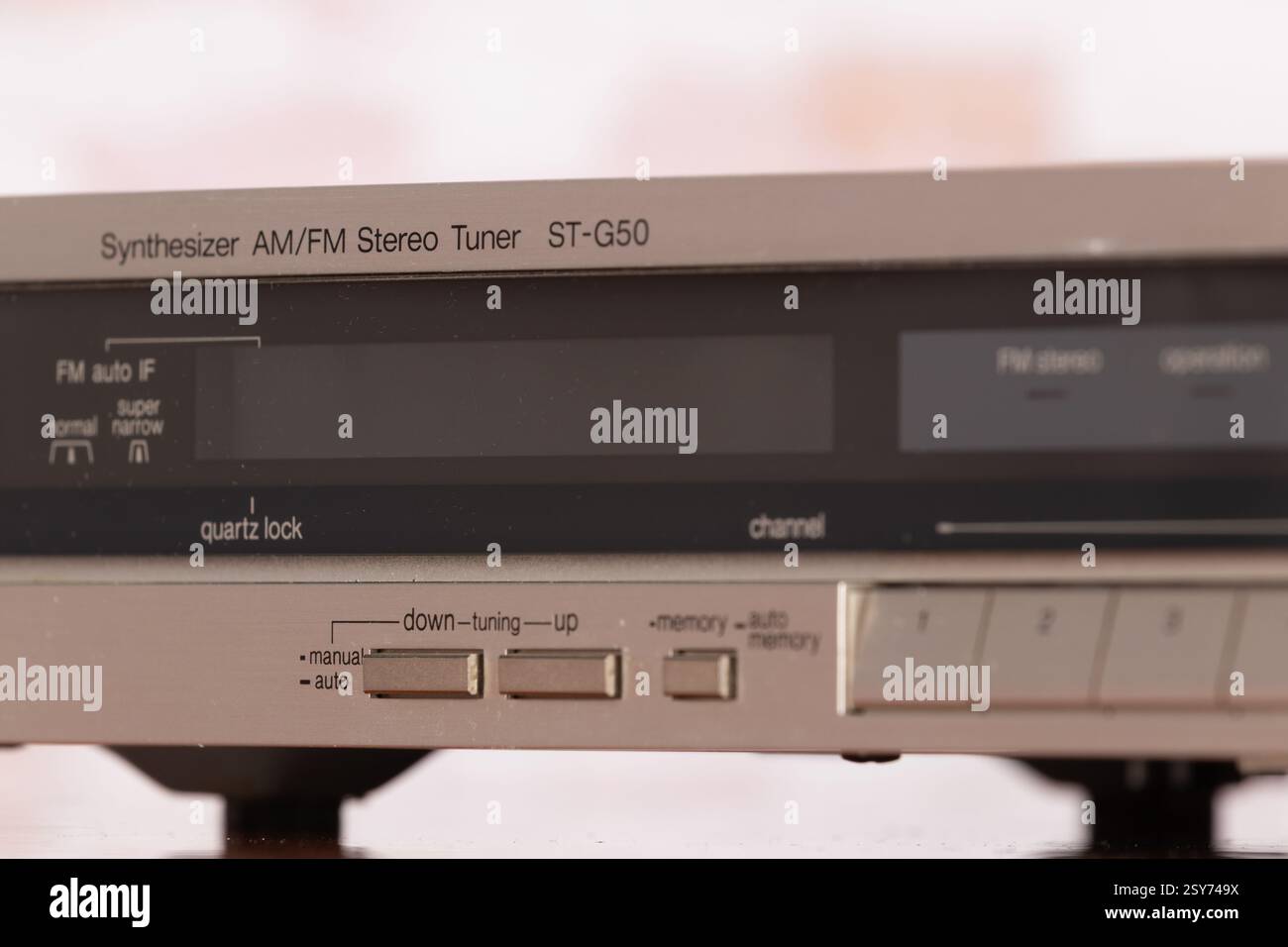 Detailed examination of a vintage radio with a focus on its preset ...