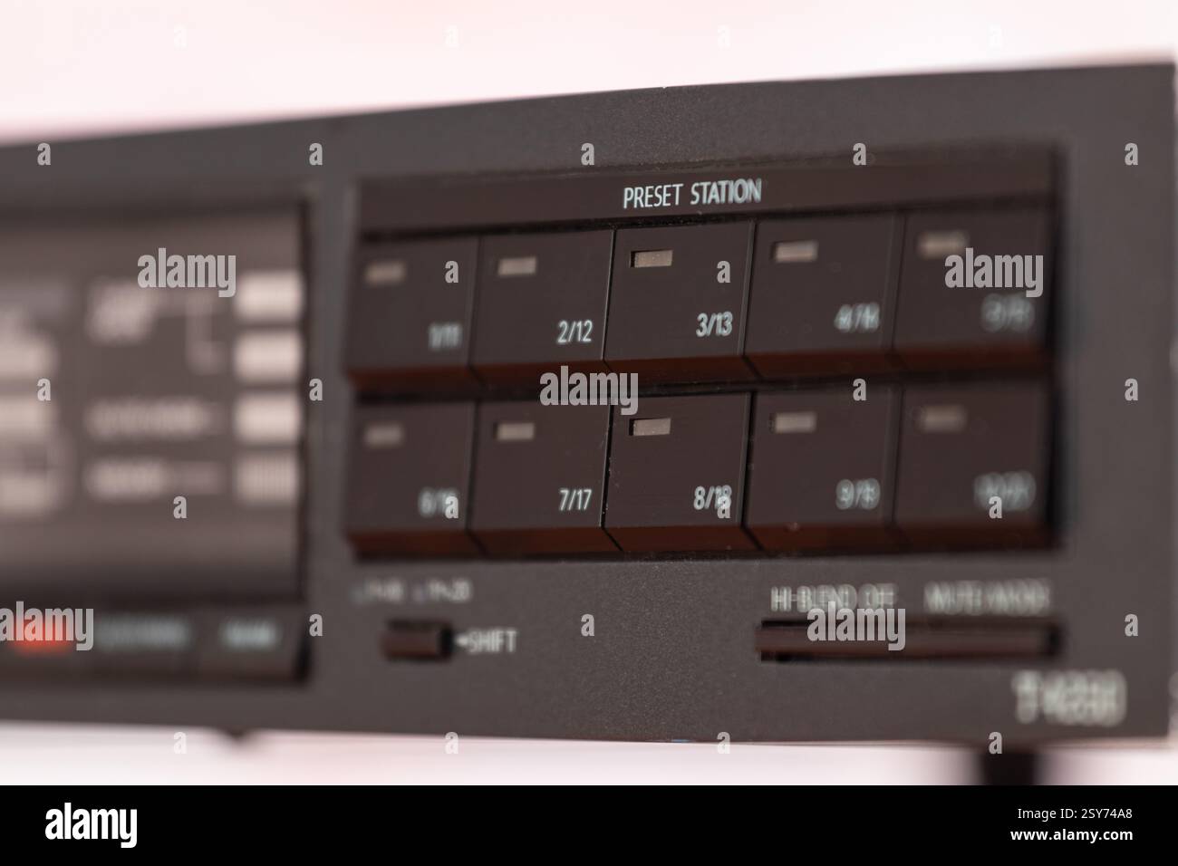Detailed examination of a vintage radio with a focus on its preset ...