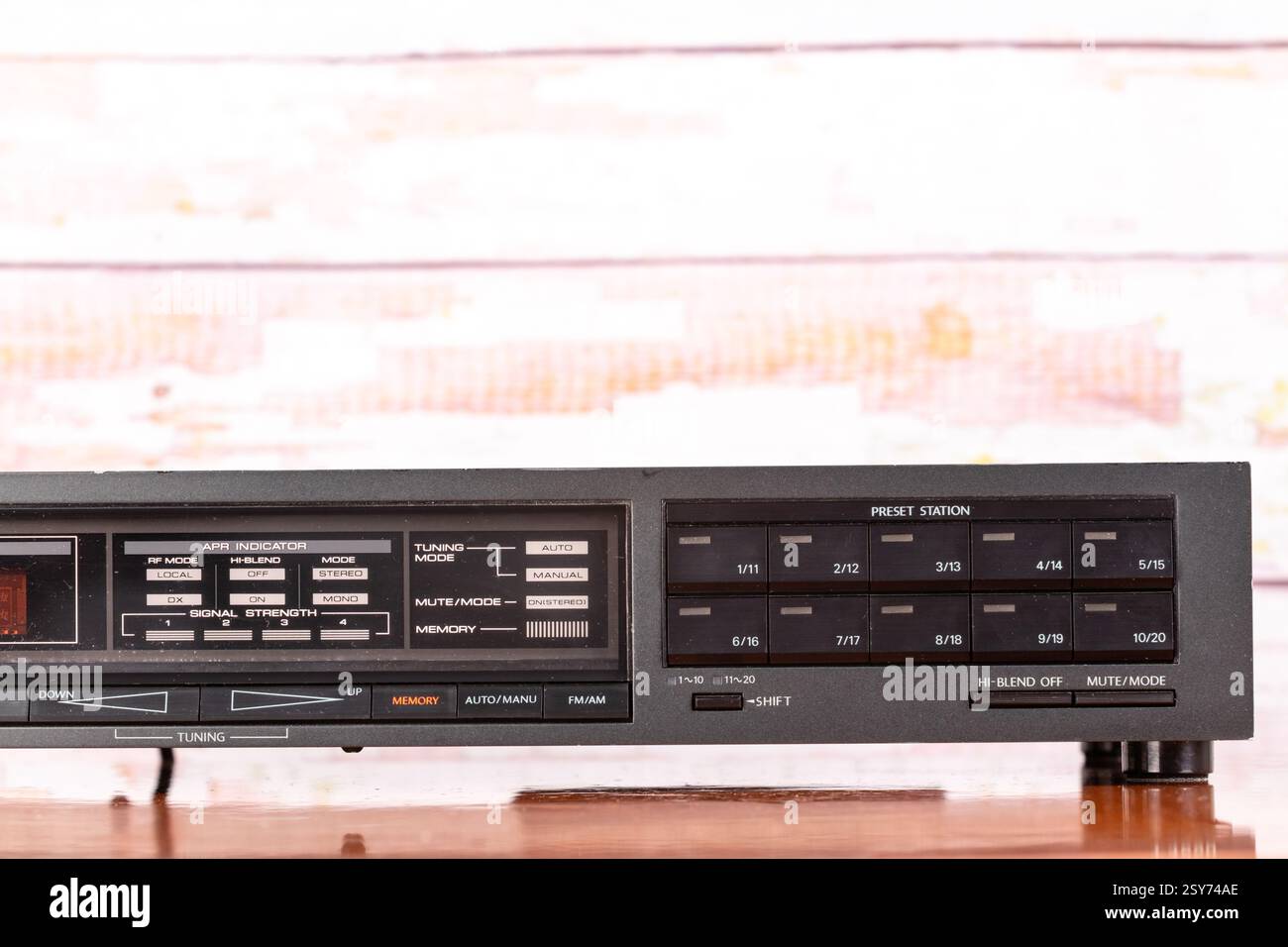 Vintage black stereo receiver with labeled controls and preset buttons ...