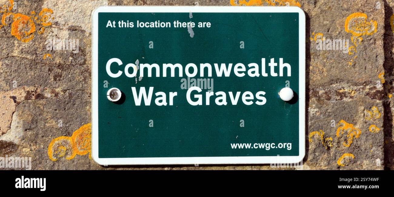 Commonwealth War Graves sign on a gate post, Saltford cemetery, near ...