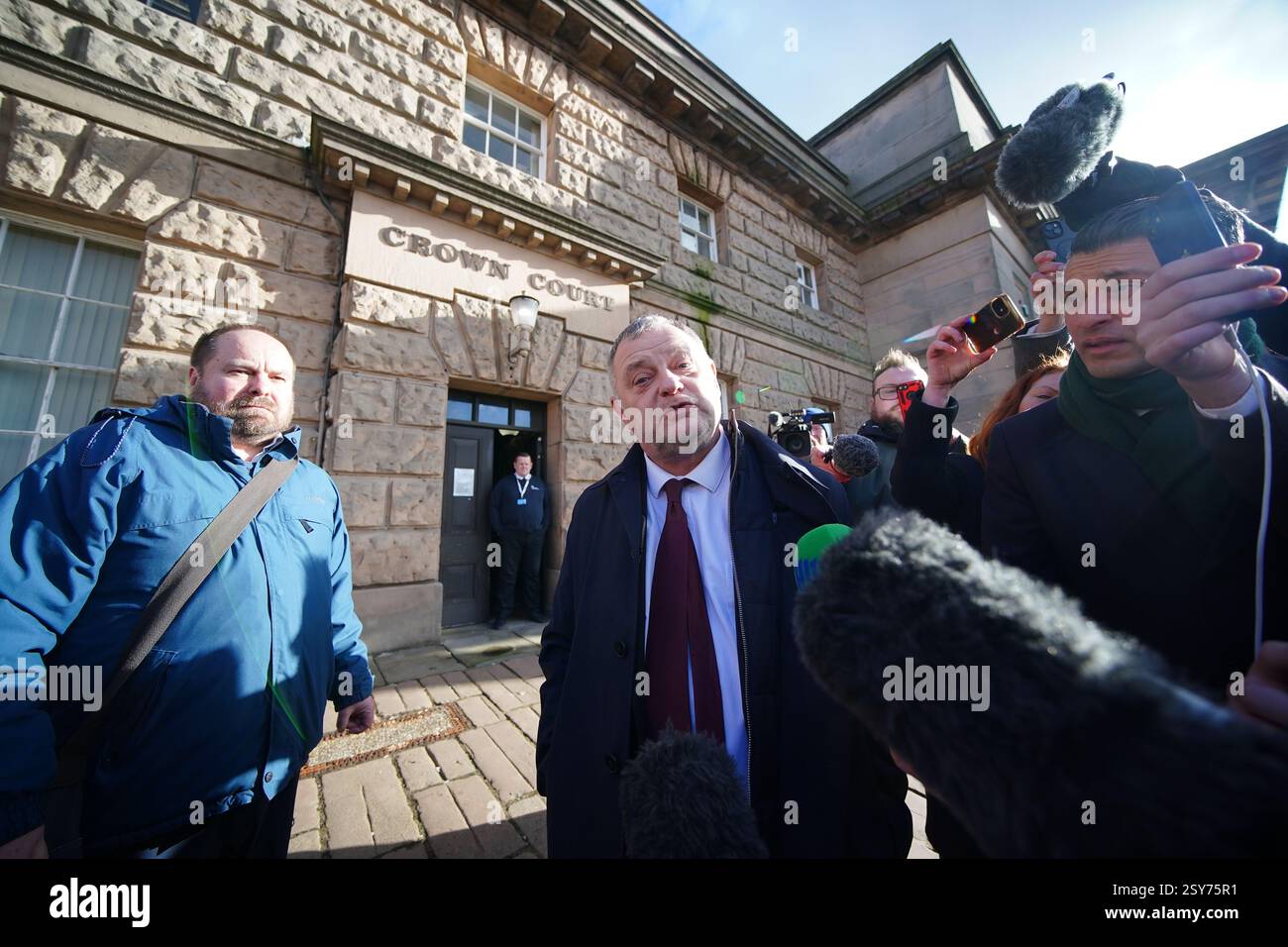 Runcorn and Helsby MP Mike Amesbury (centre) leaving Chester Crown ...