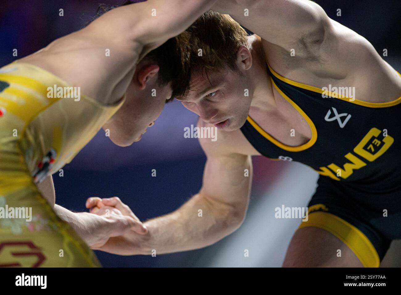 Japan's Masanosuke Ono wrestles the United States' Spencer Lee during ...