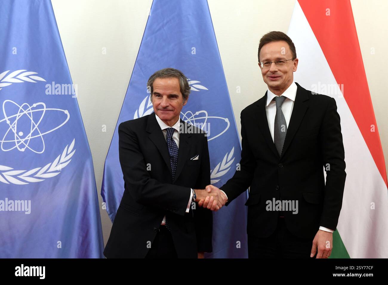 Hungarian Minister of Foreign Affairs and Trade Peter Szijjarto, right ...