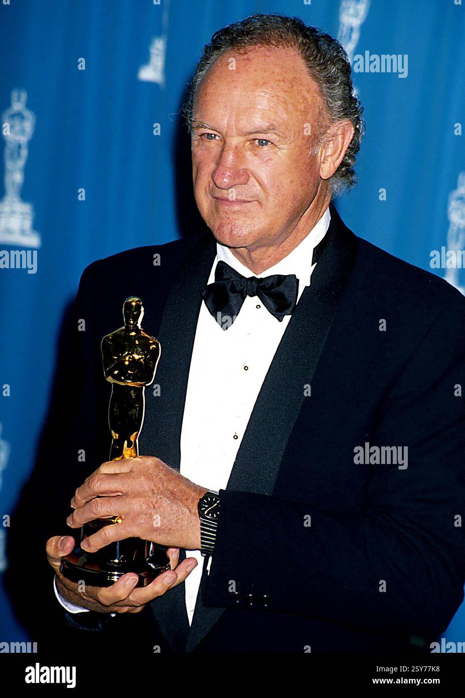 March 29, 1993: Hollywood, CA, US: GENE HACKMAN holds his award for ...