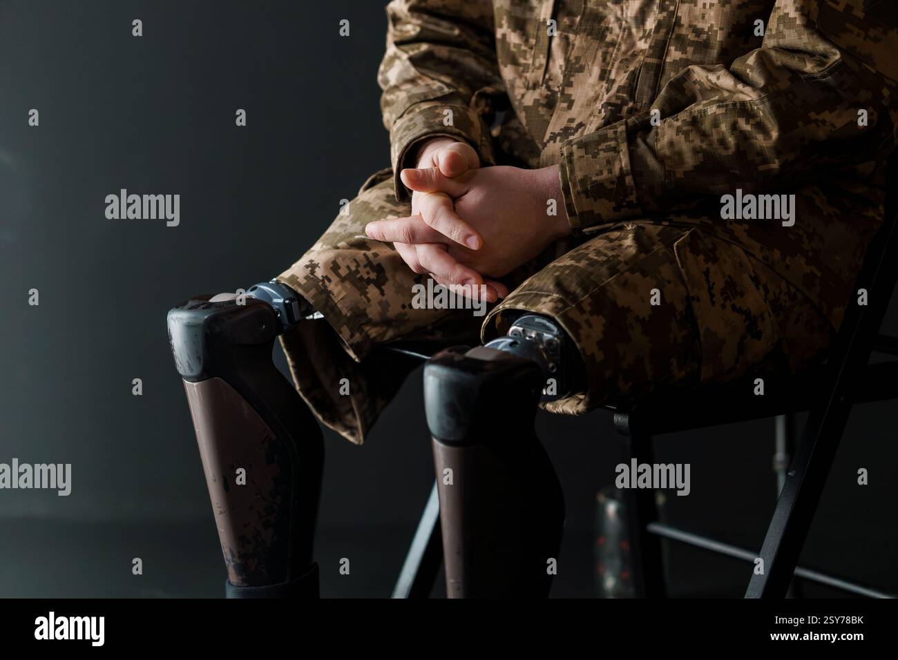 A Veteran in Military Attire Demonstrates Resilience with Advanced ...