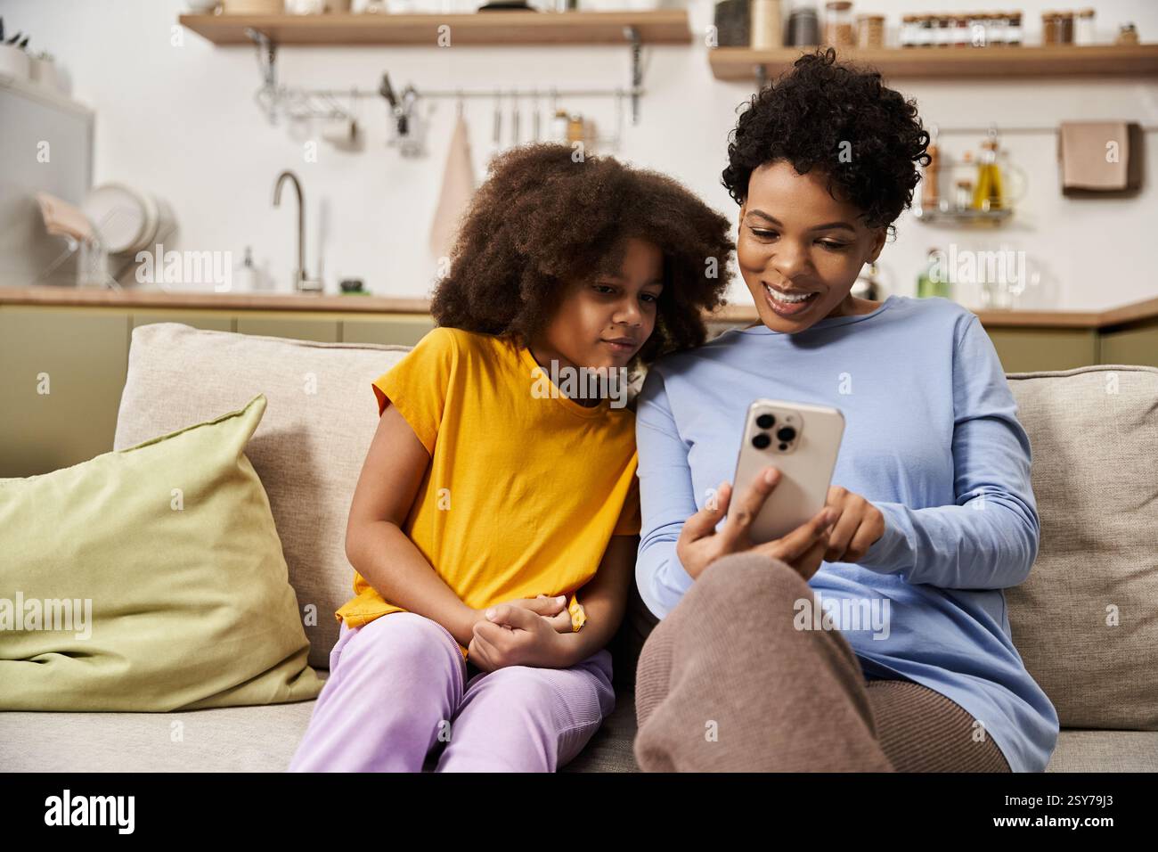 Two family members share smiles and enjoy quality time together in a ...