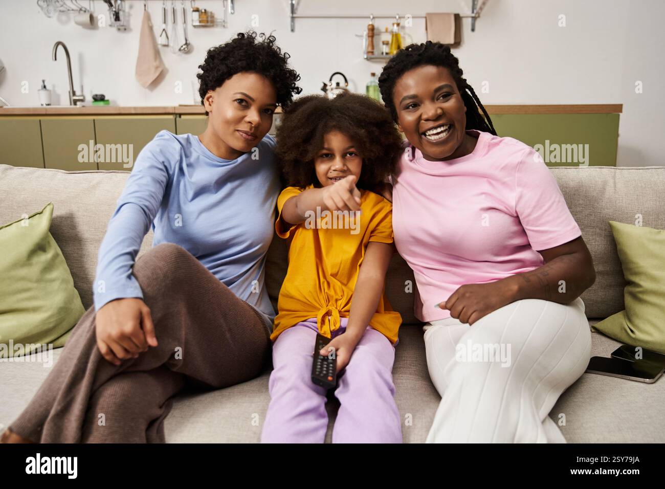 Playful family moments shared hi-res stock photography and images - Alamy