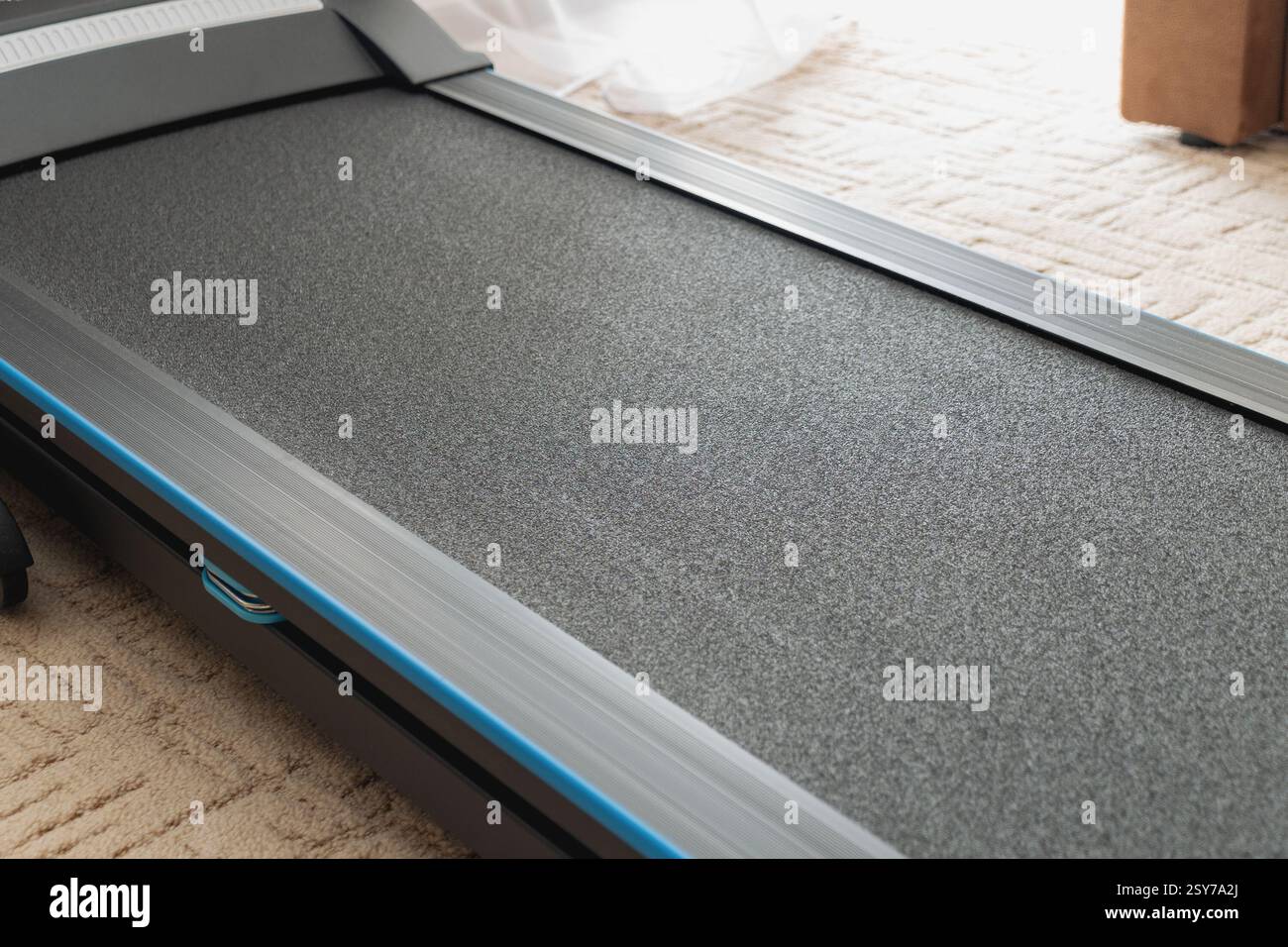 Treadmill in the room. Home workouts. Home gym Stock Photo - Alamy