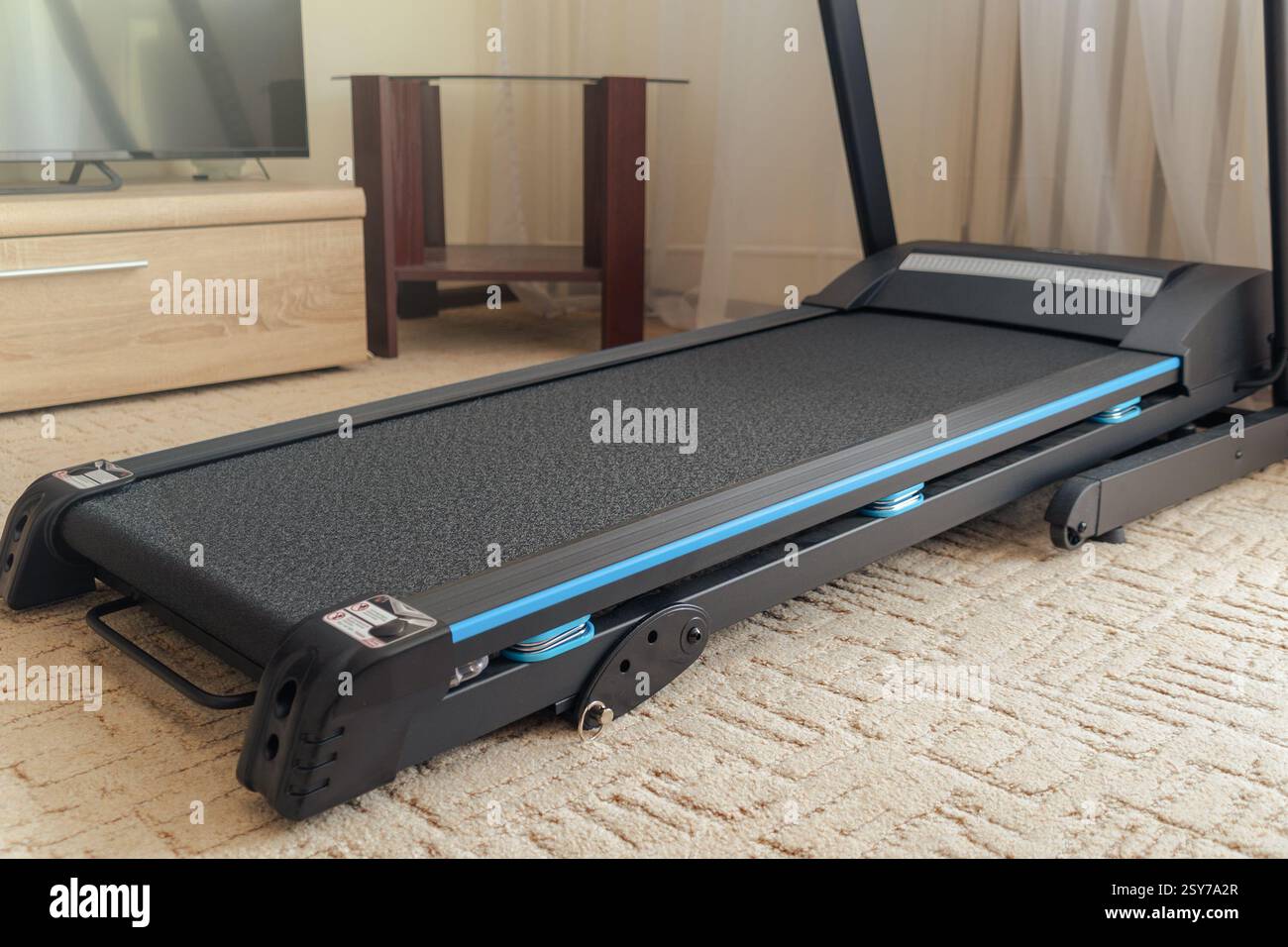 Treadmill in the room. Home workouts. Home gym Stock Photo - Alamy