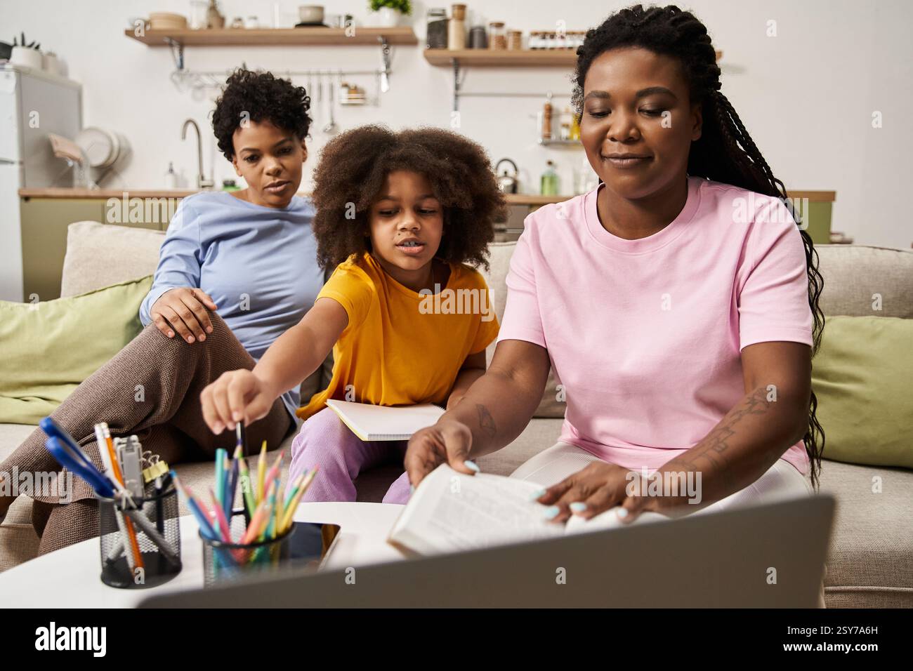 A lively family enjoys laughter and creativity in their cozy living ...