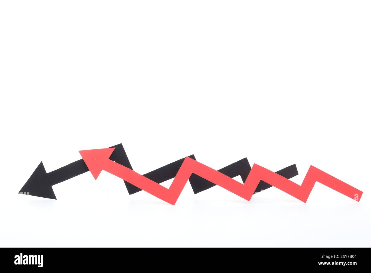 Two color paper arrows isolated on white Stock Photo - Alamy