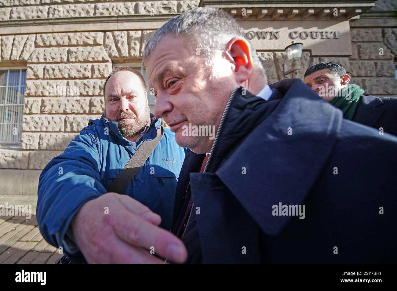 Runcorn and Helsby MP Mike Amesbury (centre) leaving Chester Crown ...