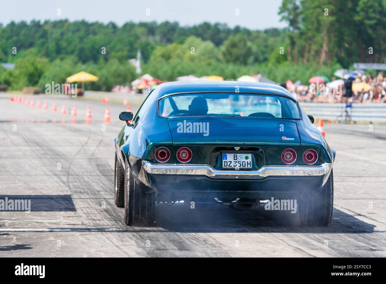 The muscle car Chevrolet Camaro (second generation) on the racing line ...