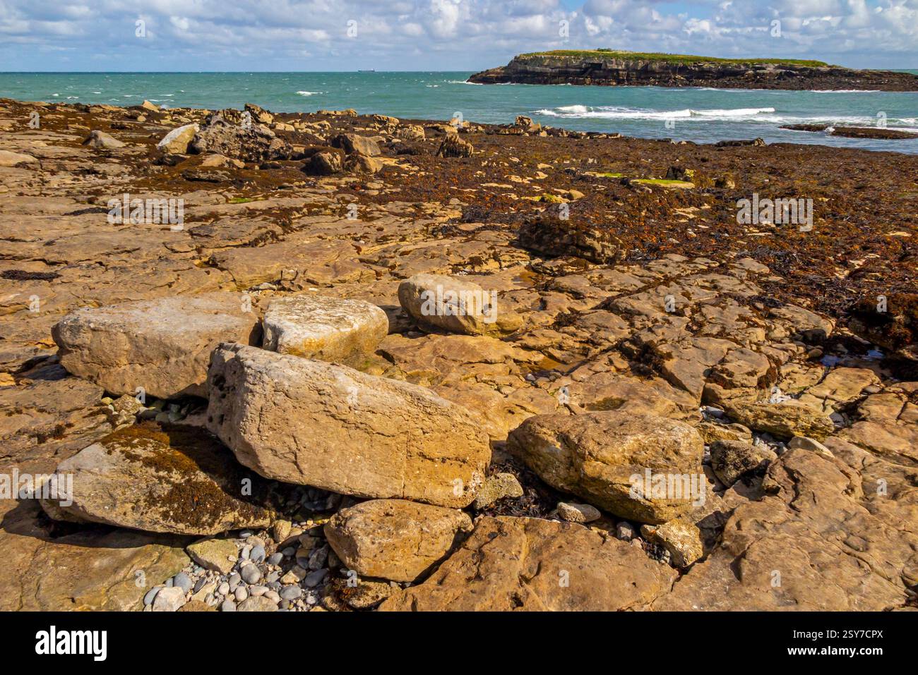 View looking from the beach across the channel Y Swnt towards Ynys ...