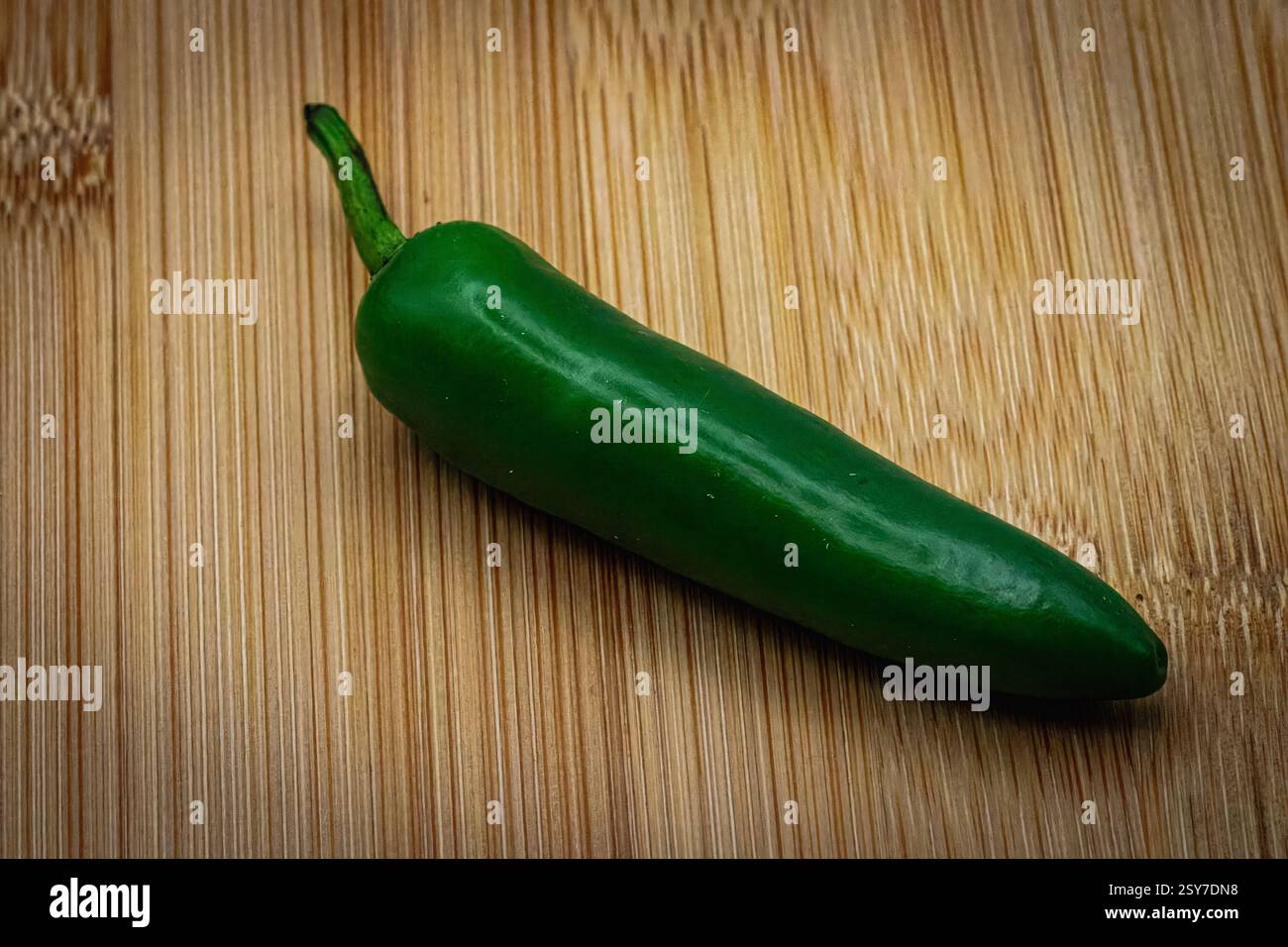 Chillies, isolate, wooden board and chopped Stock Photo - Alamy