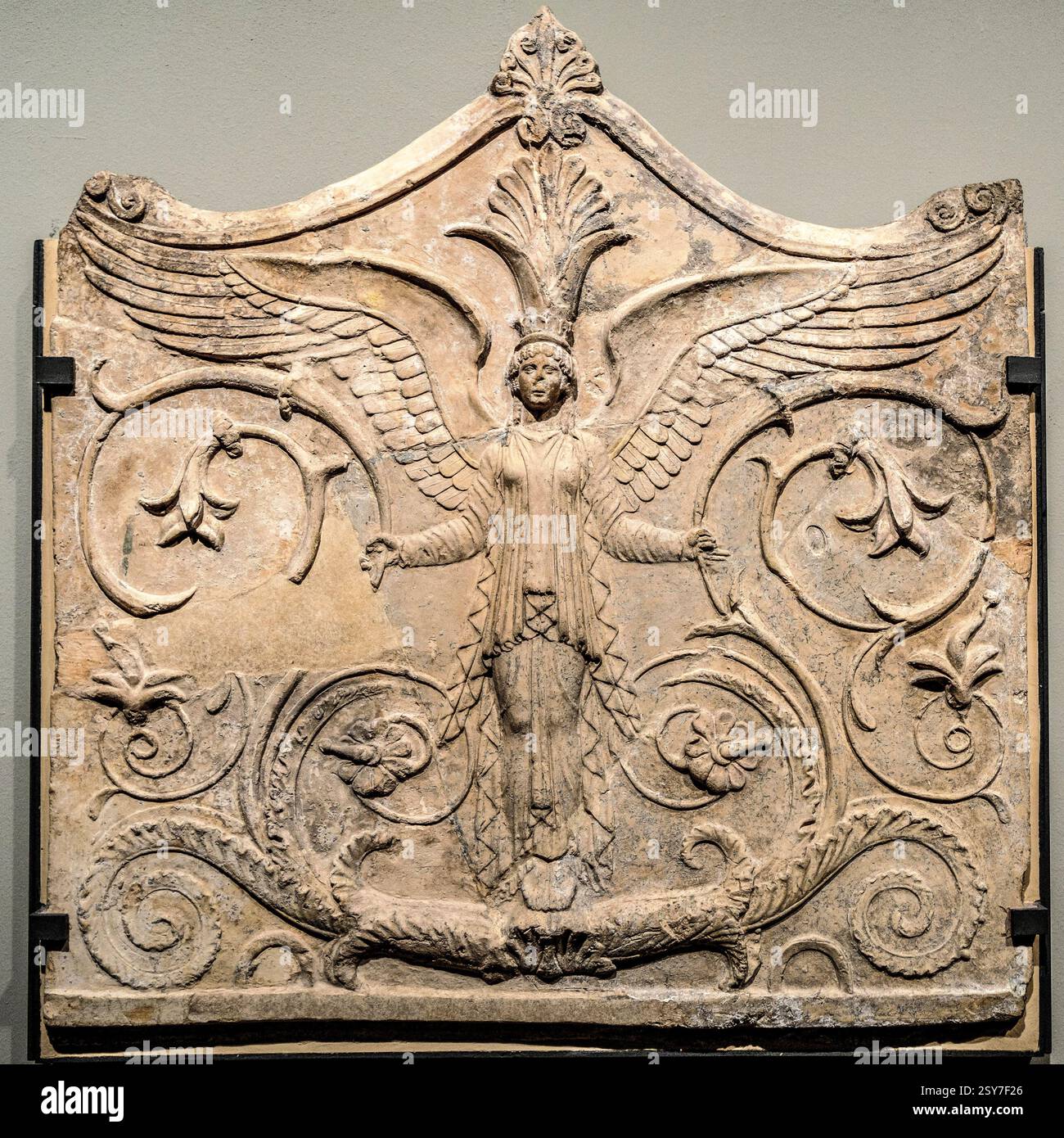 Victory among the rollers, 1st century BC , clay with polychrome ...