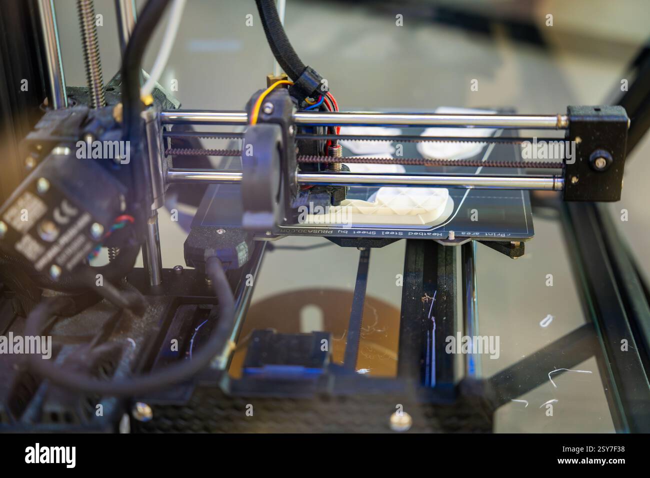 3D printer creating plastic objects with precision and speed. The ...