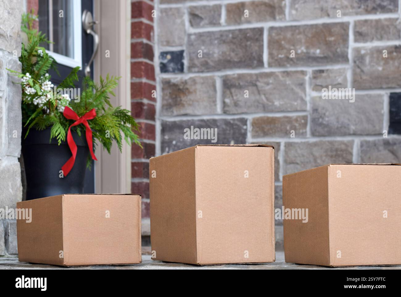 Parcel boxes on front porch of a house during Christmas time Stock ...