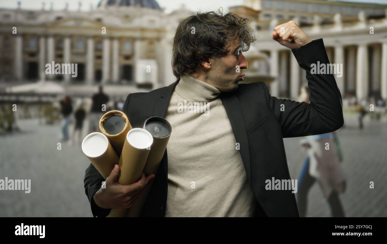 Young hispanic man making a strong gesture with his arm in st. peter's ...