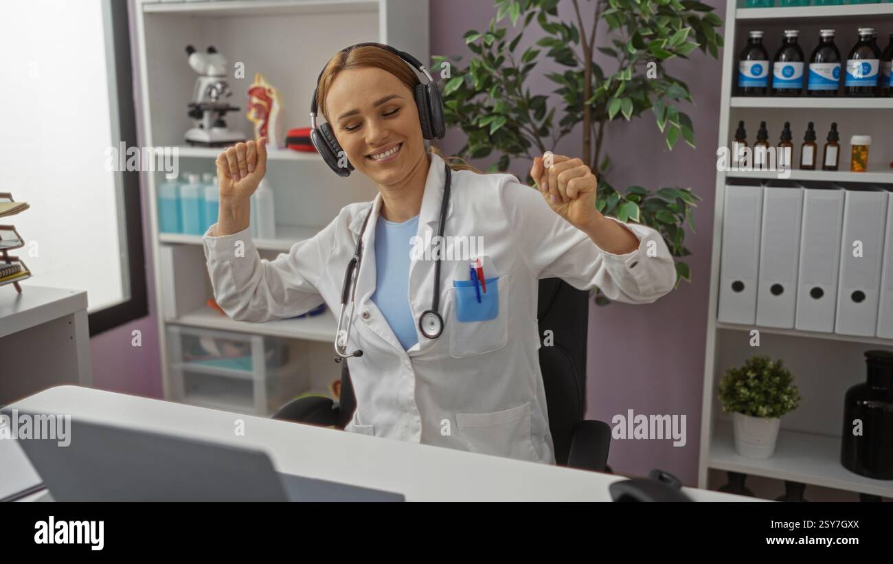 Fun doctor dancing in office hi-res stock photography and images - Alamy