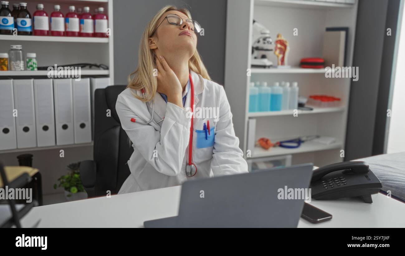 Woman doctor sitting in clinic office feeling neck pain, wearing white ...