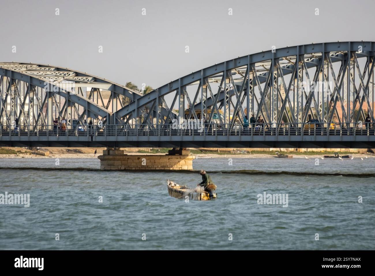 Senegali fisherman in the boat catching fish with nets close to the ...