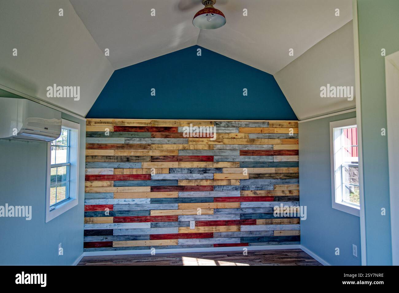 Finished pallet wall with multicolor and textures on the back interior ...