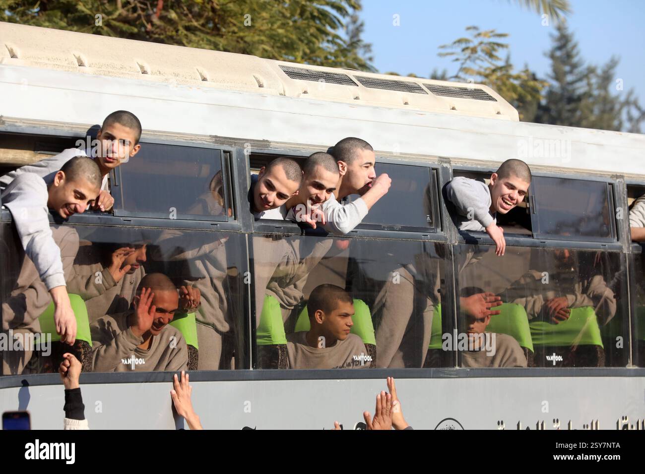 A bus carrying former Palestinian prisoners arrives at the European ...