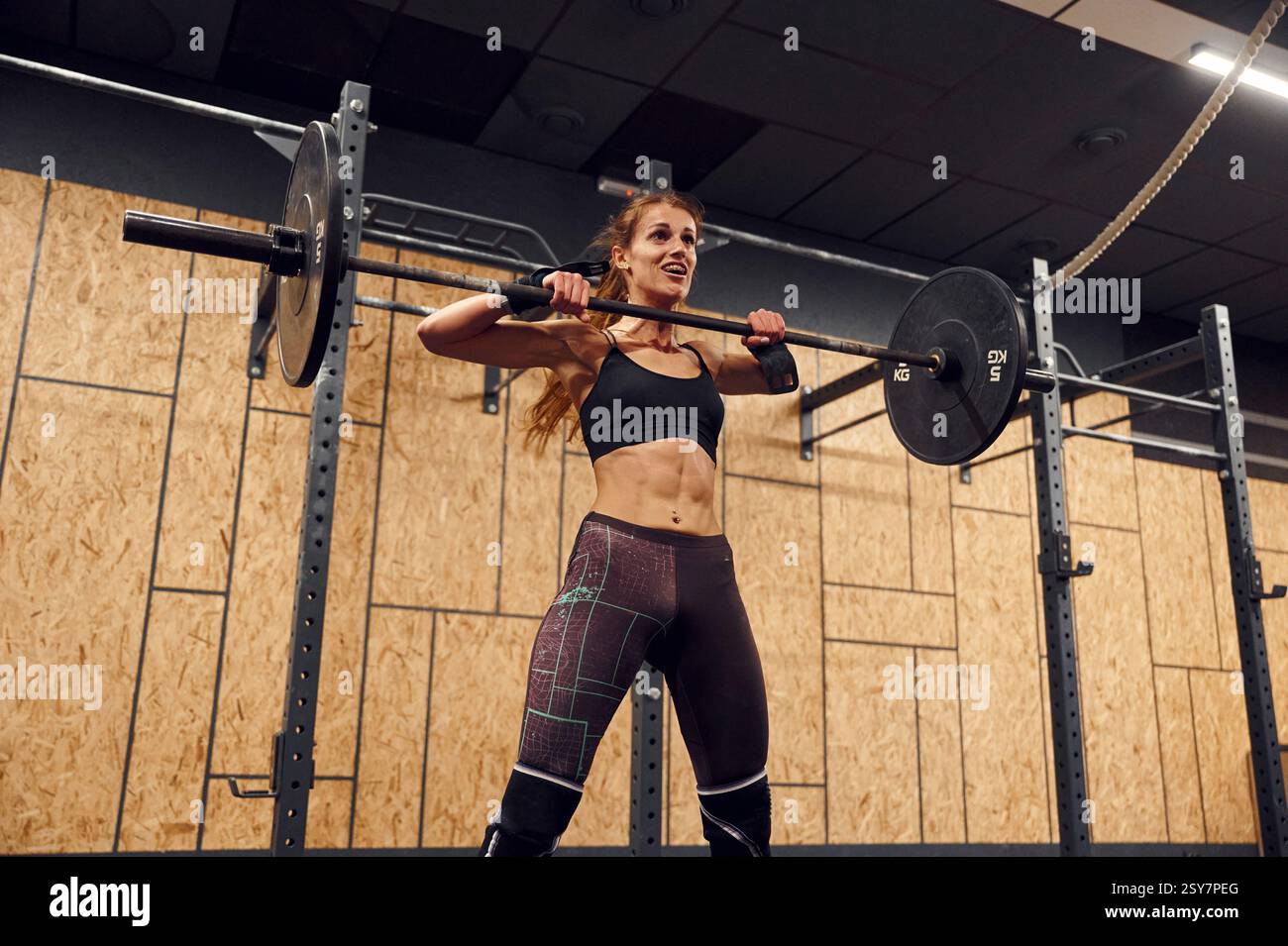 Woman legs lifting weights hi-res stock photography and images - Alamy