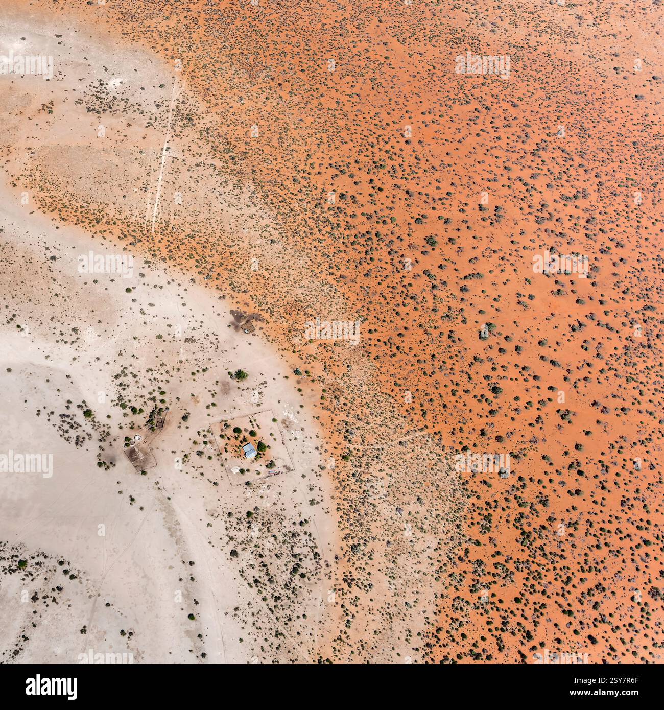 aerial landscape with farm on pan side in Kalahari desert, shot from a ...