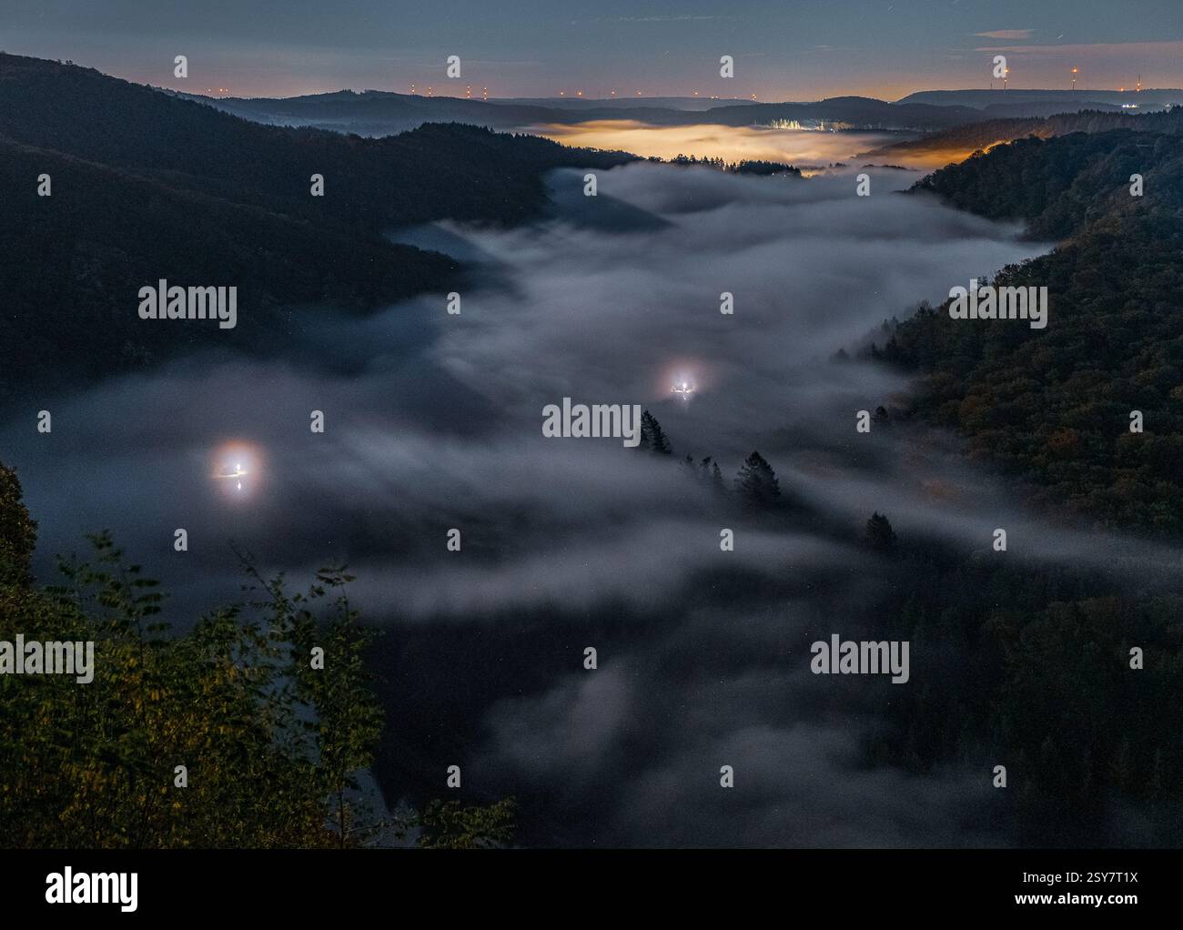 fog over the mountains and the vale at night in German, Europe. Fog at ...