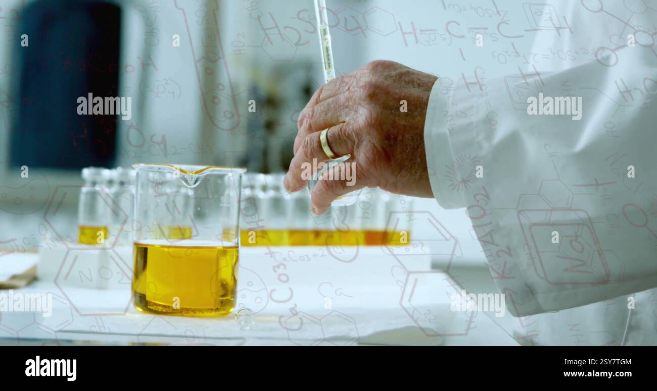 Pouring liquid into beaker, scientist working in lab with chemical ...
