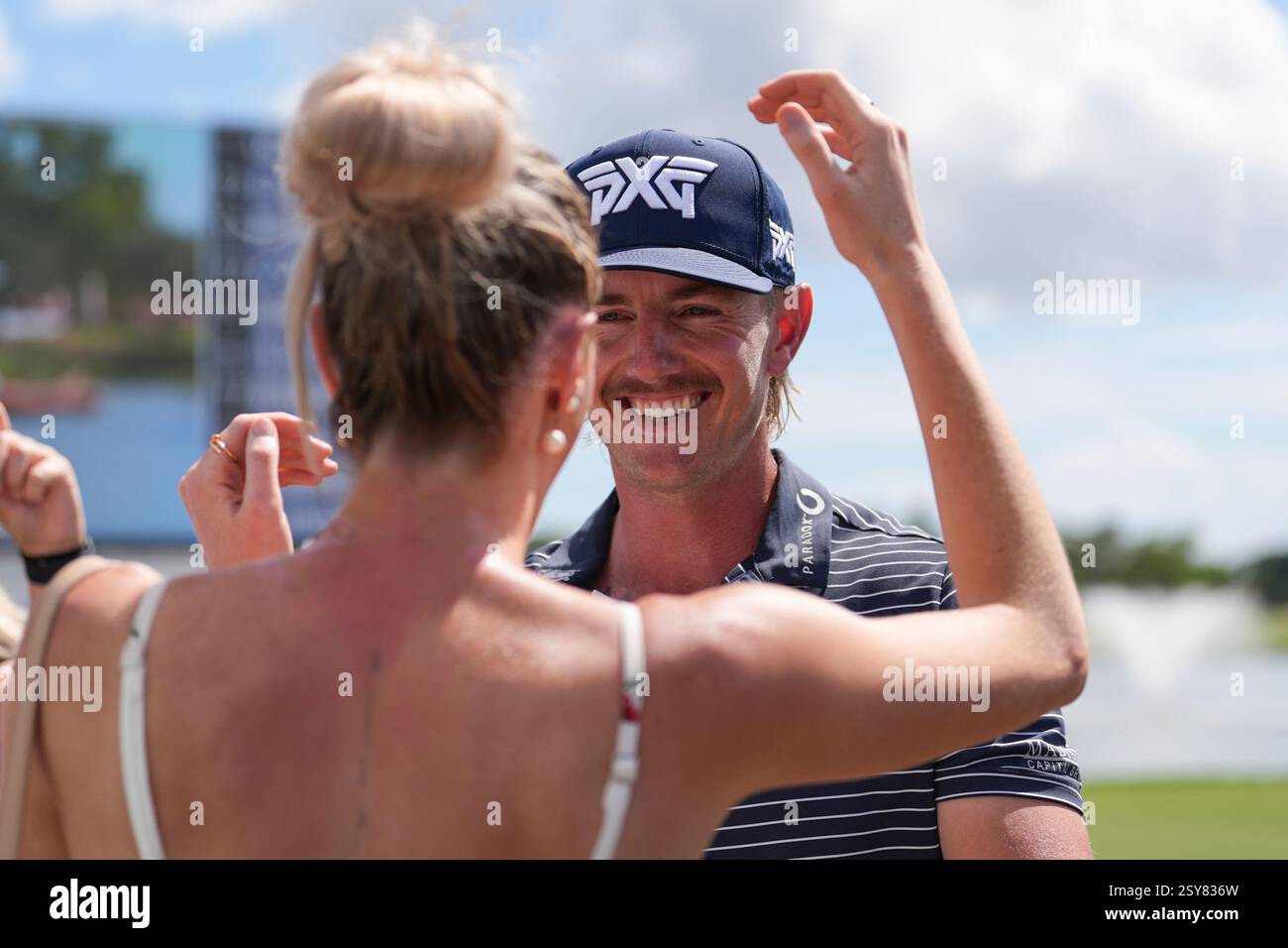 Jake Knapp gets a hug from girlfriend Makena White on the 18th hole after finishing with a 59 in ...