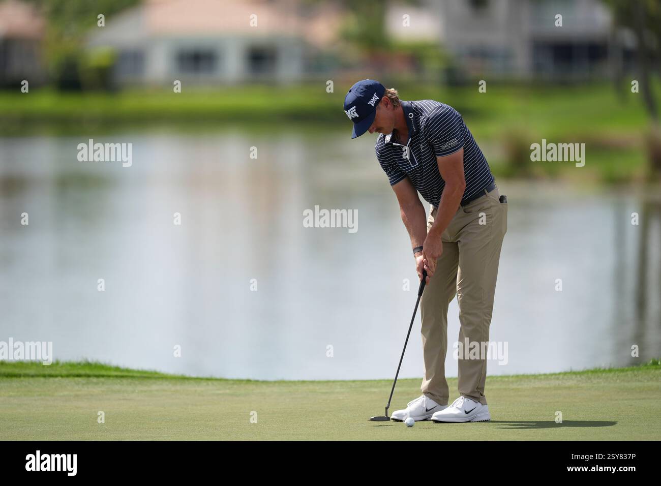 Jake Knapp putts on the 18th hole on his way to finishing with a 59 in ...