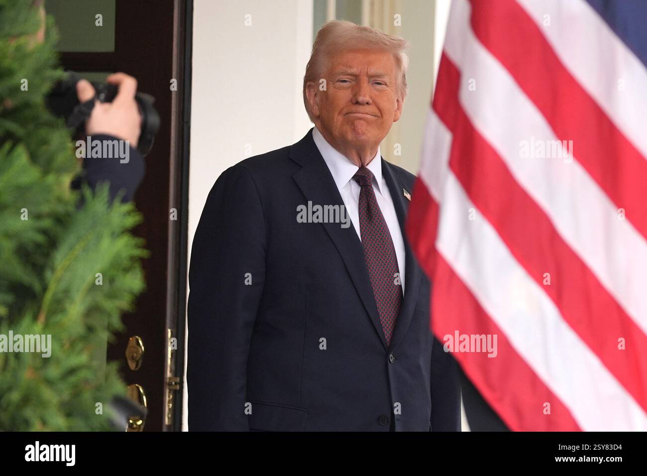 President Donald Trump stands before British Prime Minister Keir ...