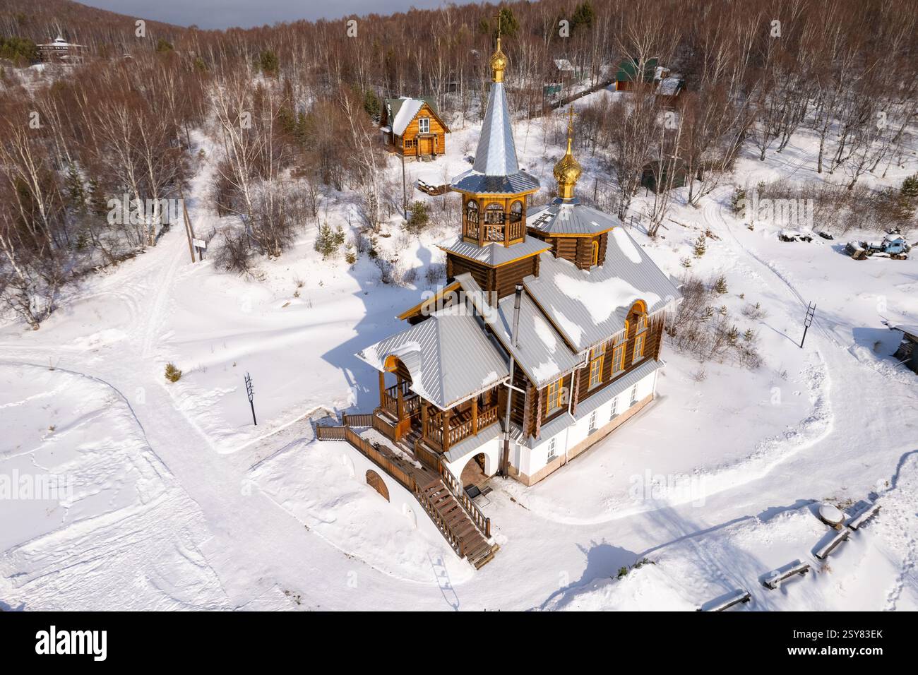 Aerial top view to wooden church of Transfiguration covered snow of the ...