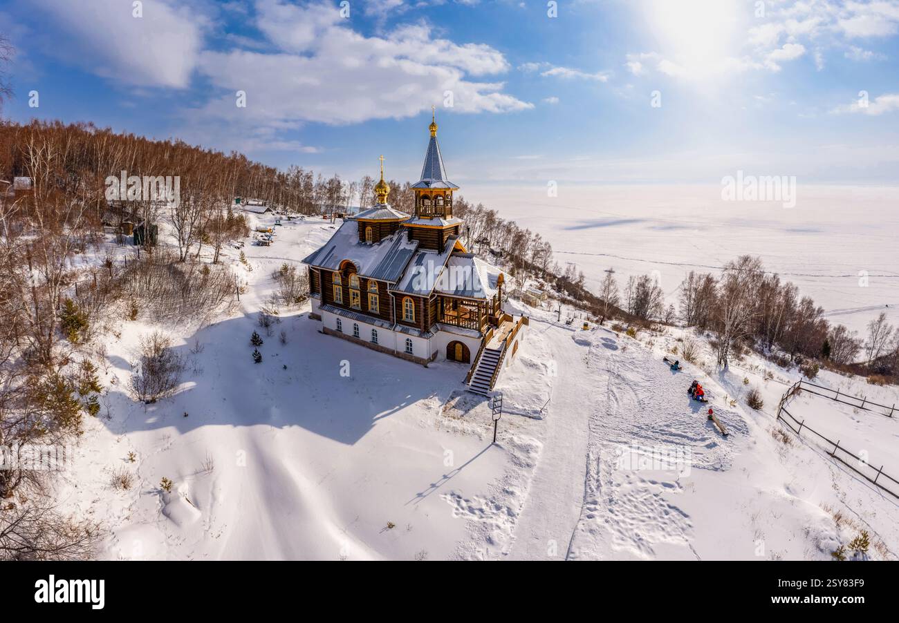 Aerial top view to wooden church of Transfiguration covered snow of the ...