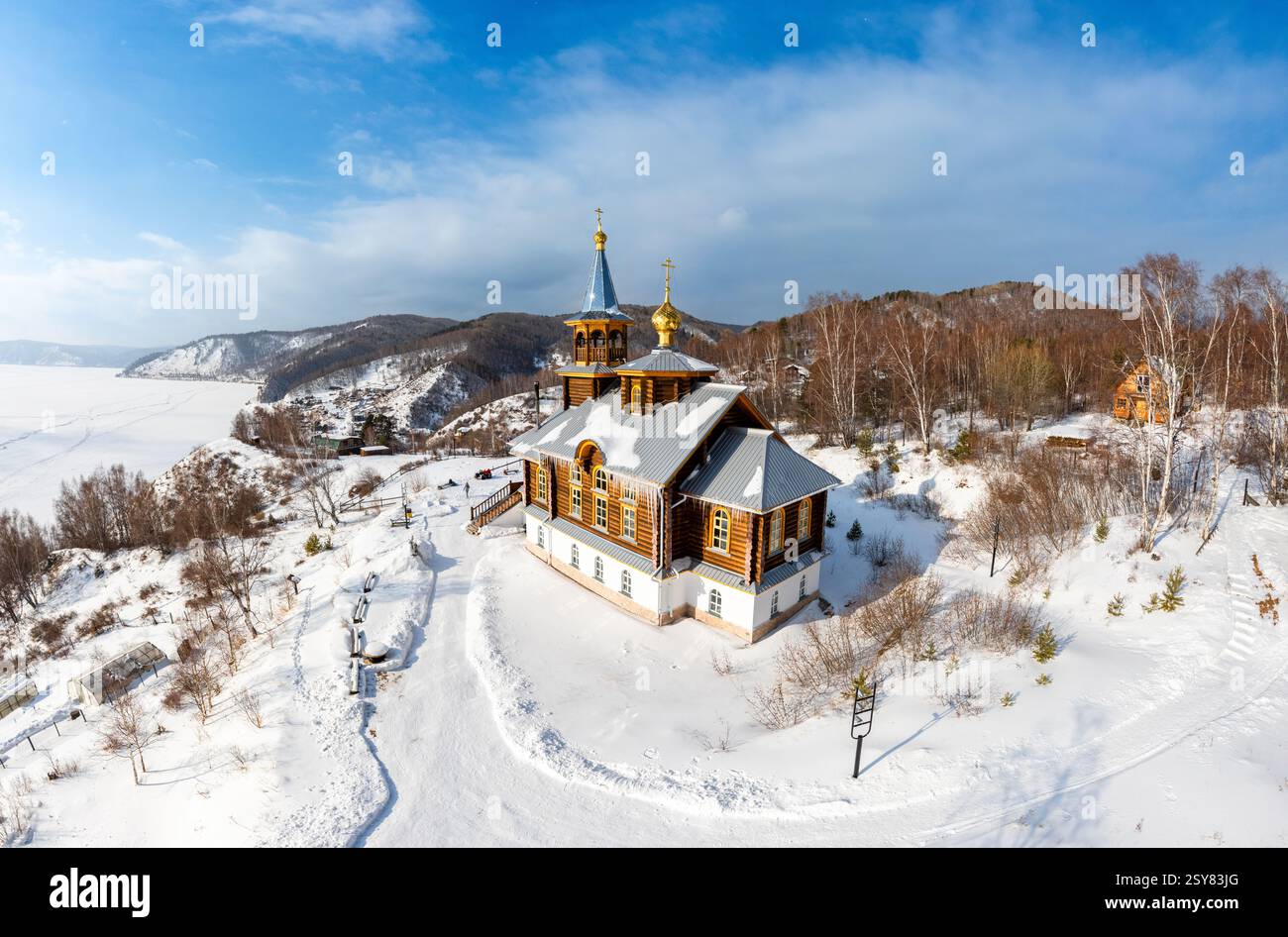 Aerial top view to wooden church of Transfiguration covered snow of the ...