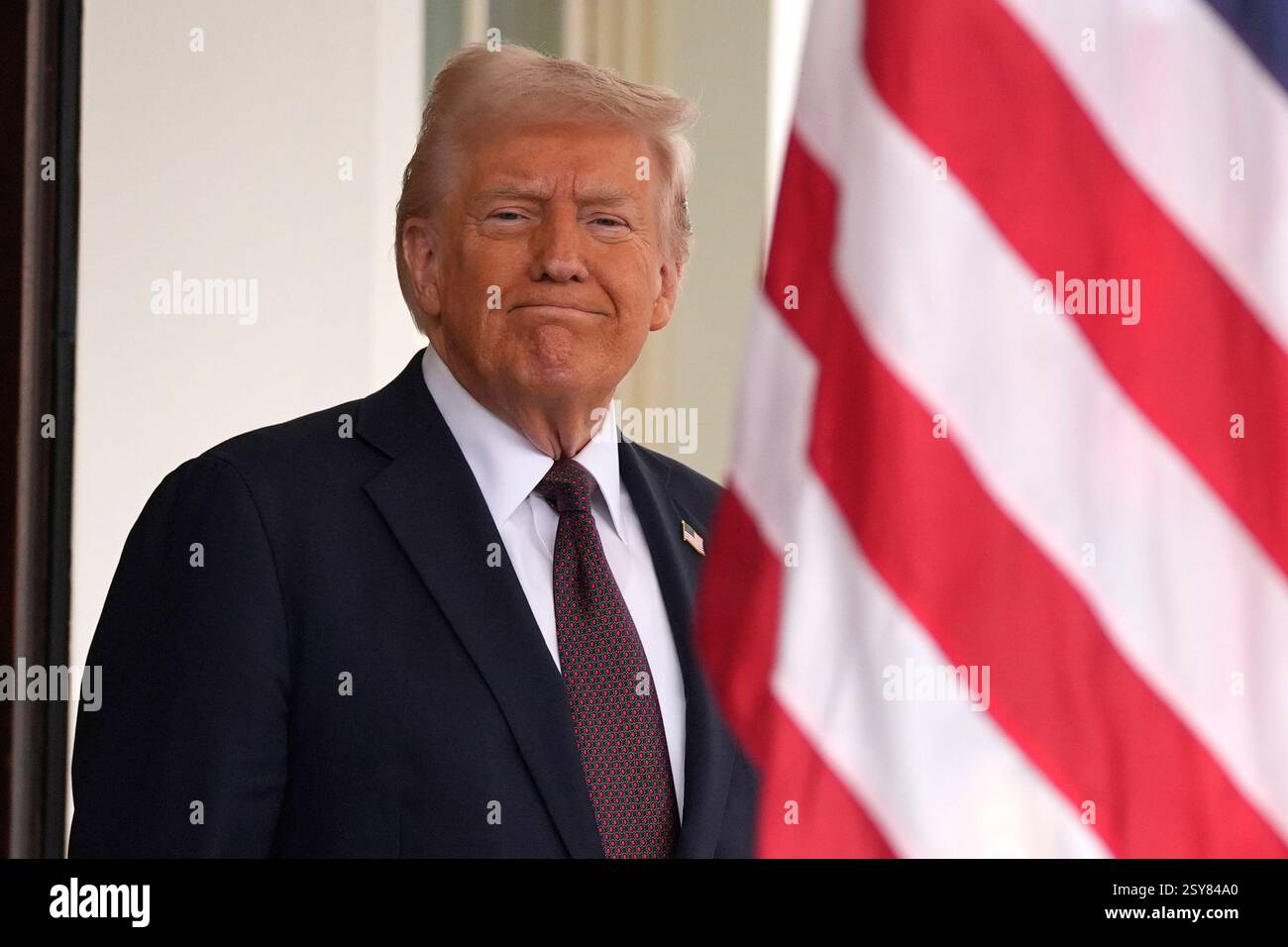 President Donald Trump stands before British Prime Minister Keir ...