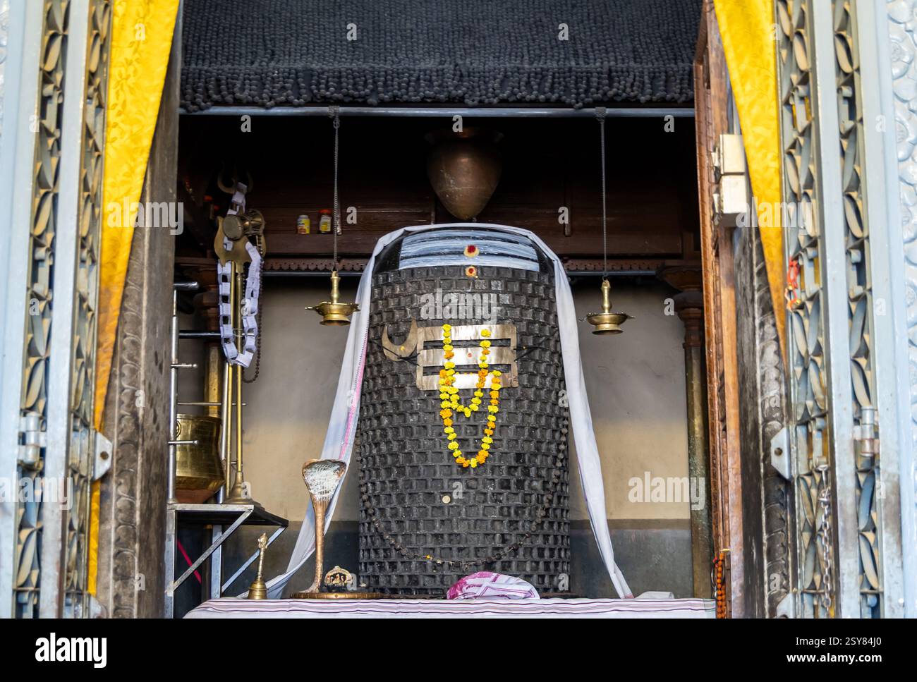 isolated huge shivlinga with tripund at holy temple at indoor Stock ...