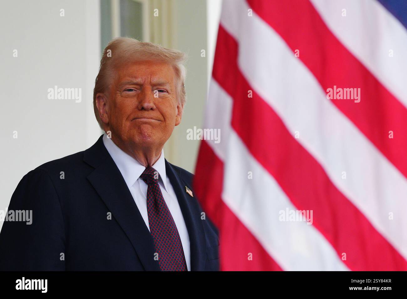 US President Donald Trump waits to greet Prime Minister Sir Keir ...
