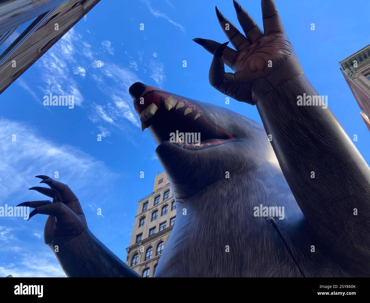 A collection of inflatable union rats outside the Empire State Building ...