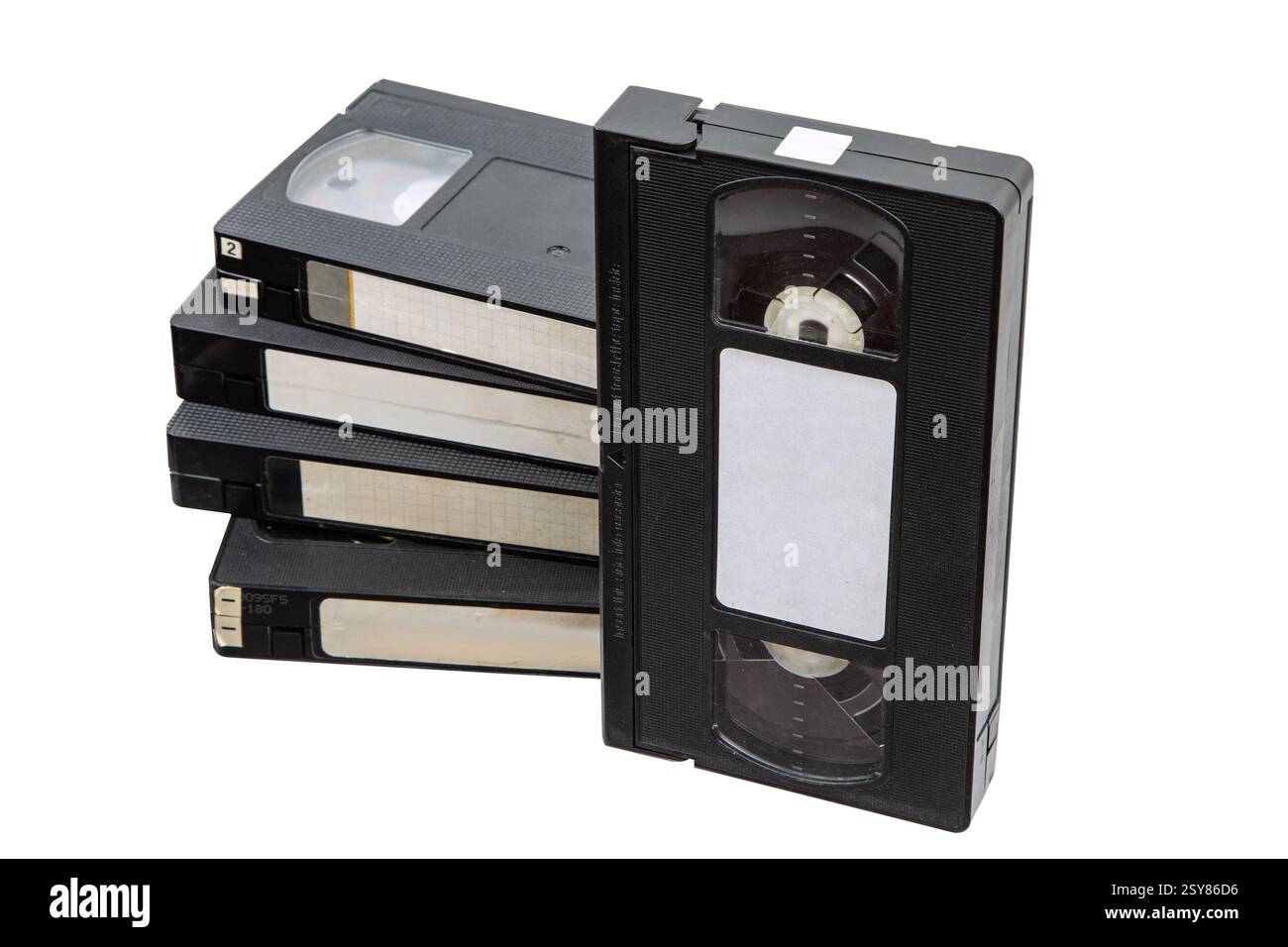 Stack of vintage VHS tapes, black plastic, blank labels, retro media ...