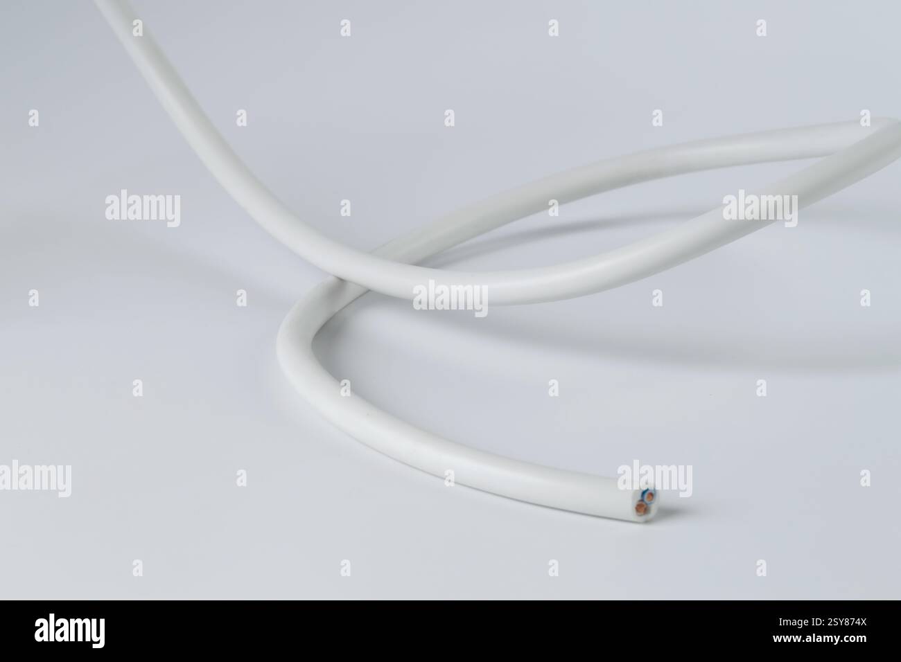 One insulated electrical wire isolated on white Stock Photo - Alamy