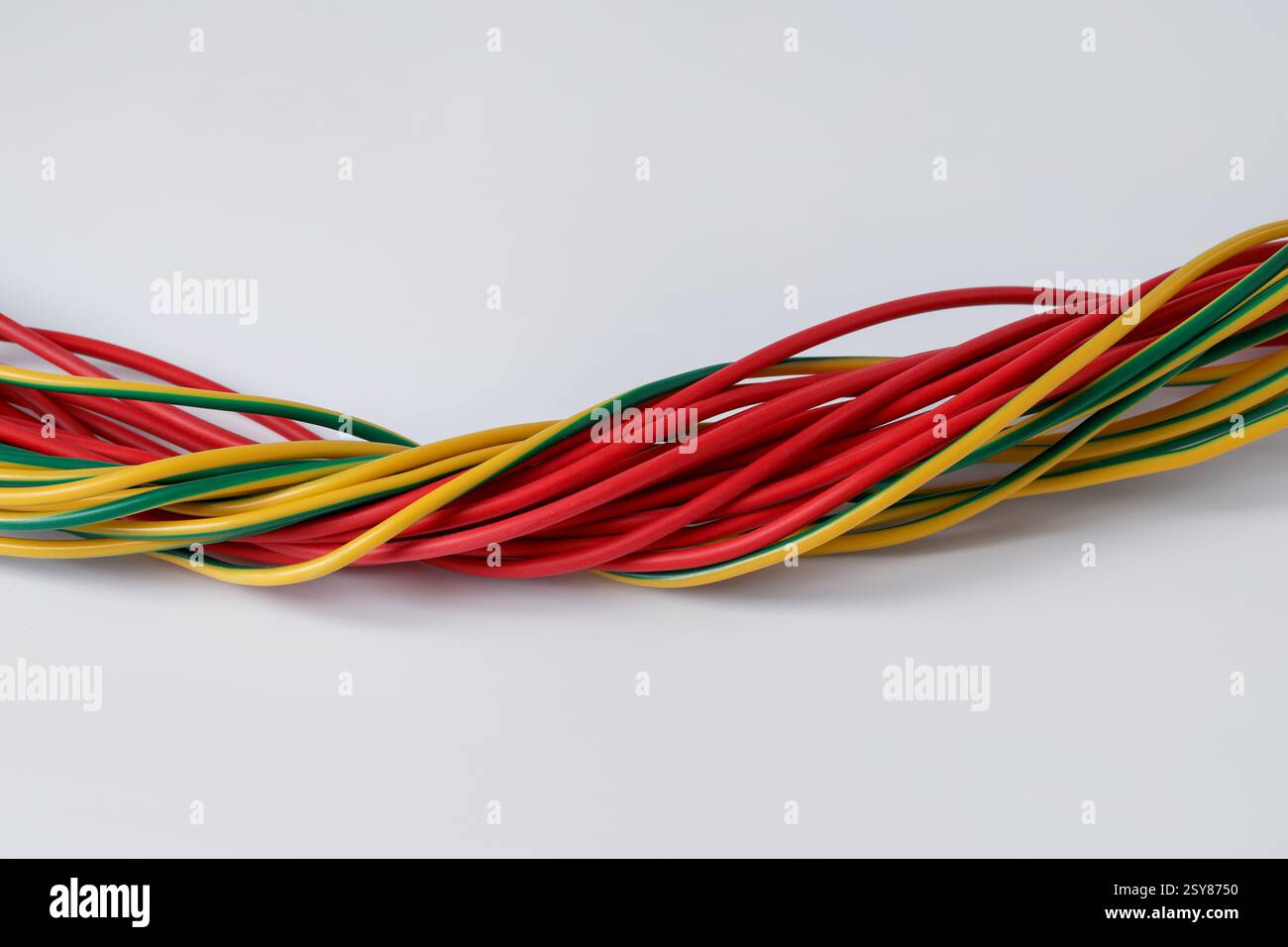 Many colorful electrical wires isolated on white Stock Photo - Alamy