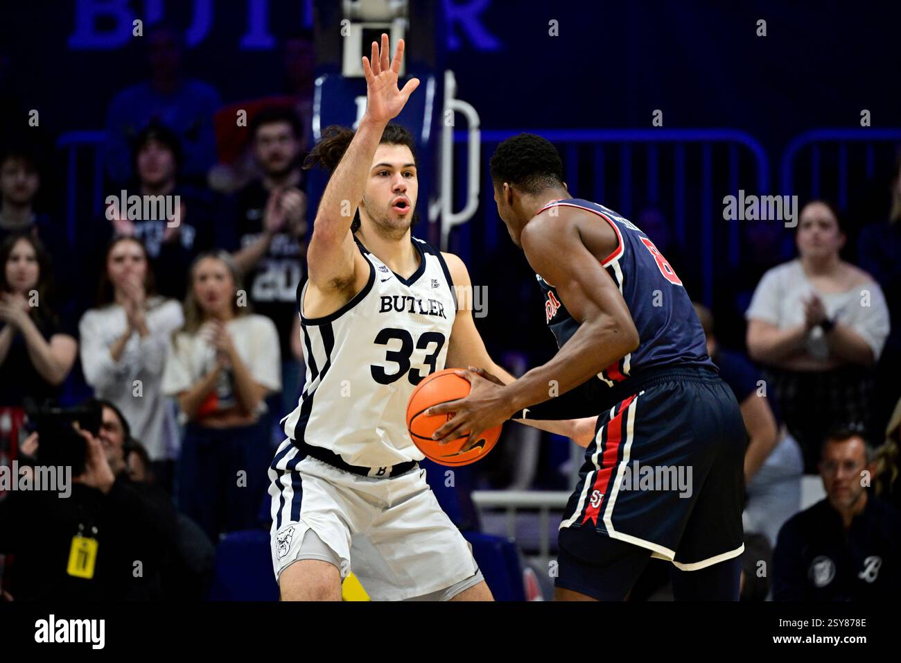 Butler forward Boden Kapke (33) defends the basket against St. John's ...